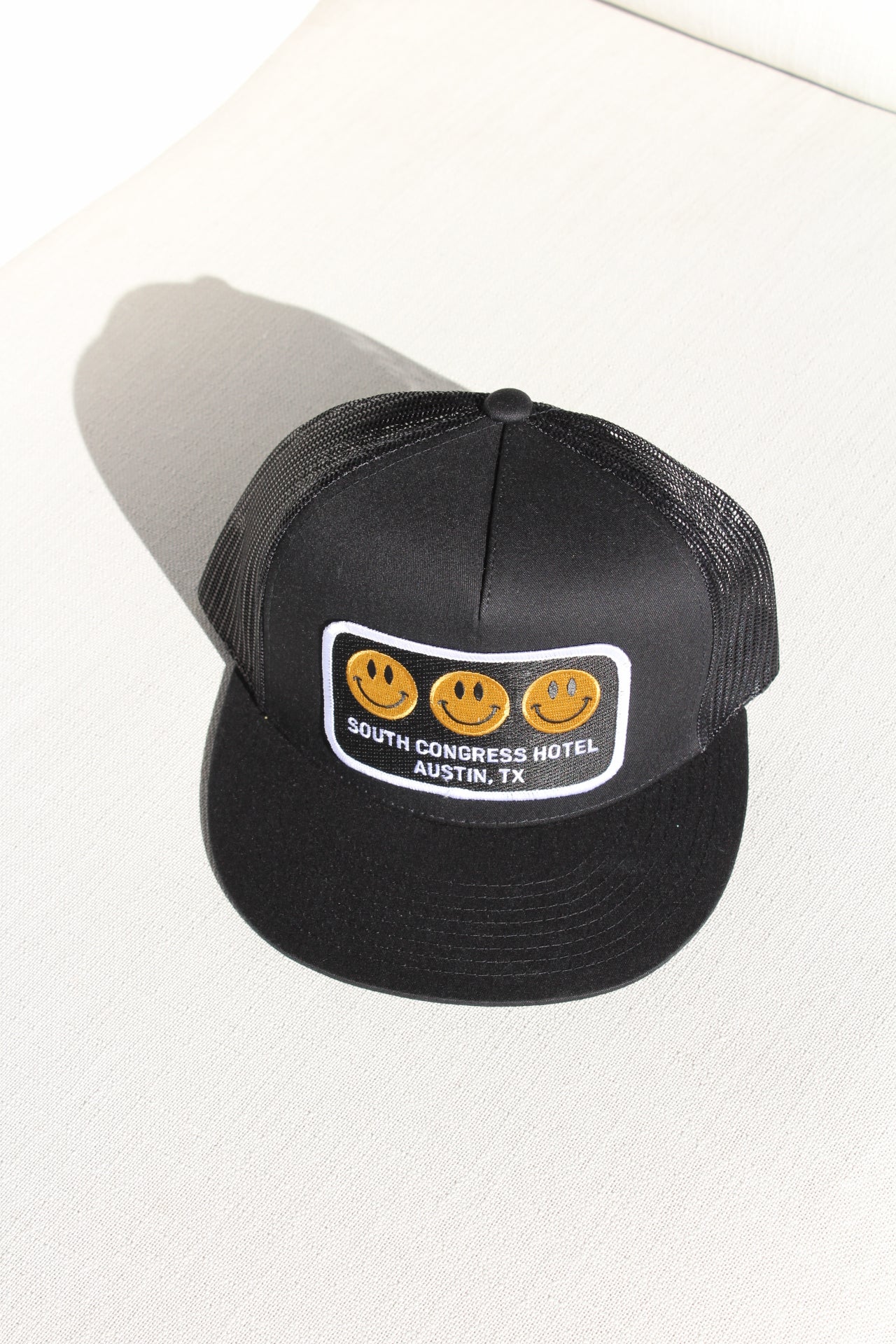 Smiley Face Hat – south congress hotel lobby shop